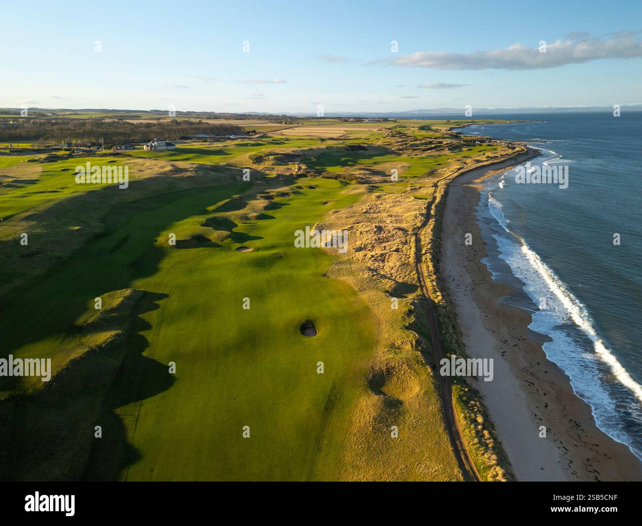 Aerial view of Kingsbarns Golf Course in winter light, Fife, Scotland ...