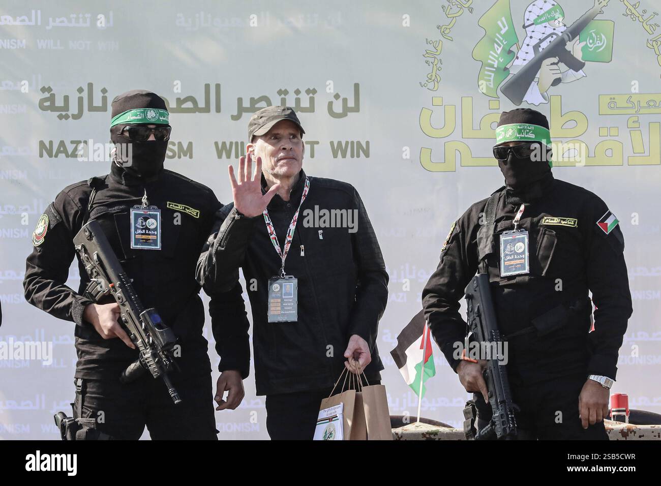 Israeli hostage Keith Siegel being delivered to representatives of the ...