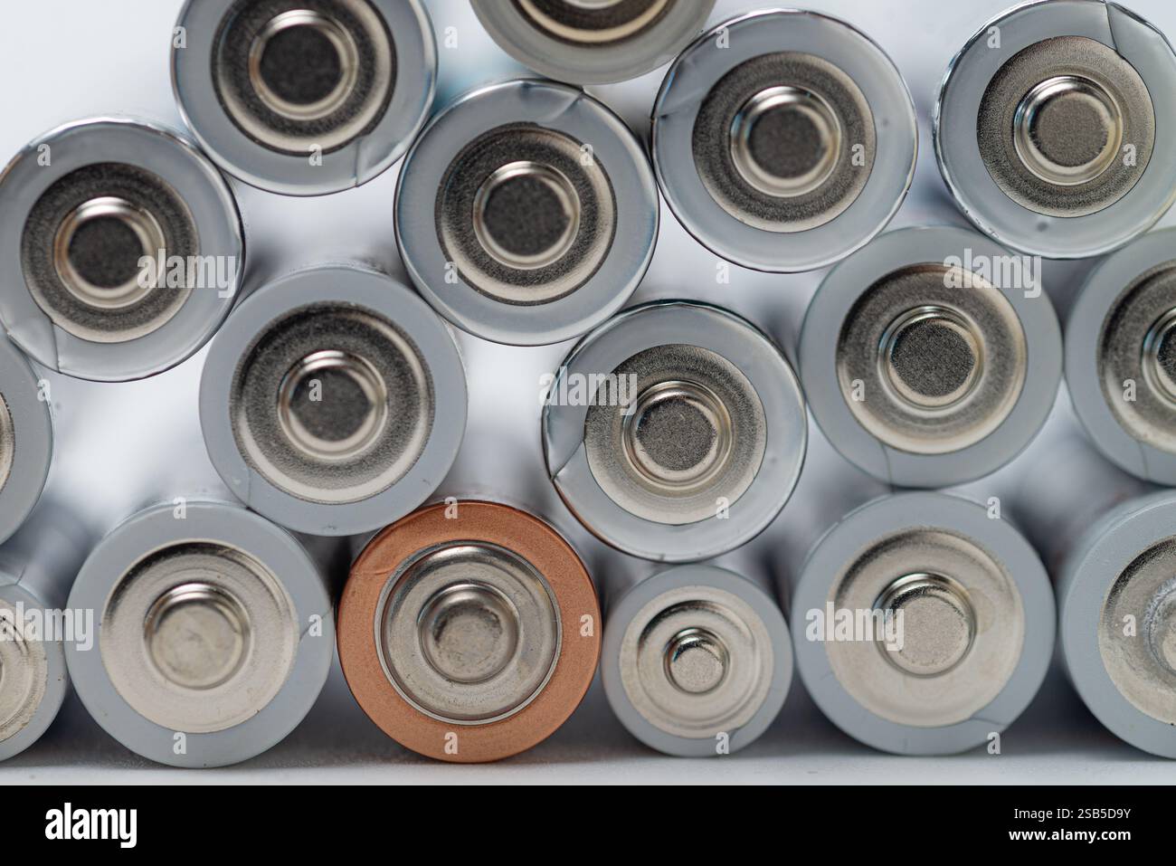 A group of Alkaline batteries showing the positive pole Stock Photo - Alamy