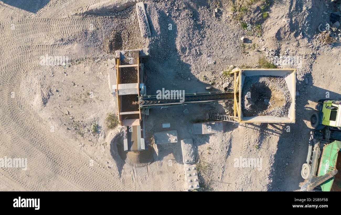 Aerial view of a quarry with a conveyor belt transporting gravel Stock ...
