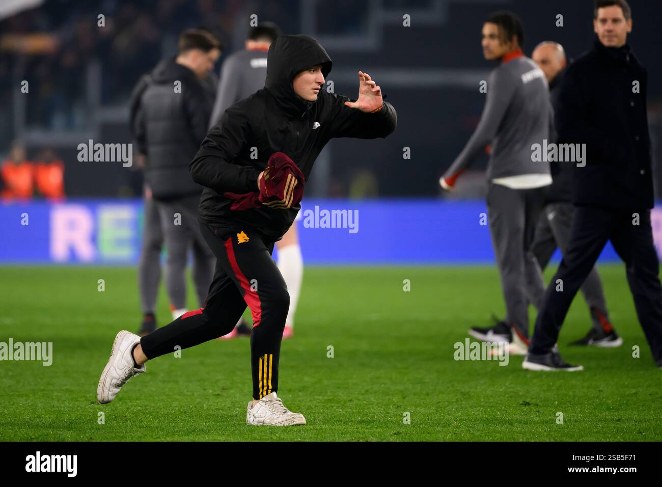 A pitch invader at the end of the Europa League football match between ...