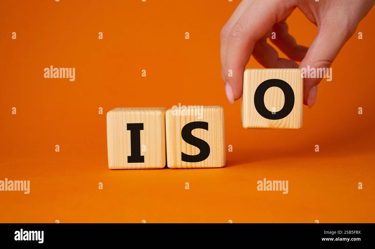 ISO standards quality control symbol. Concept word ISO on wooden cubes ...