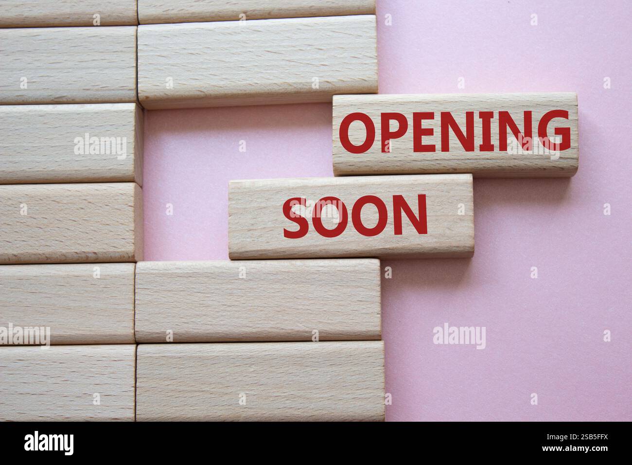 Opening soon symbol. Concept word Opening soon on wooden blocks ...