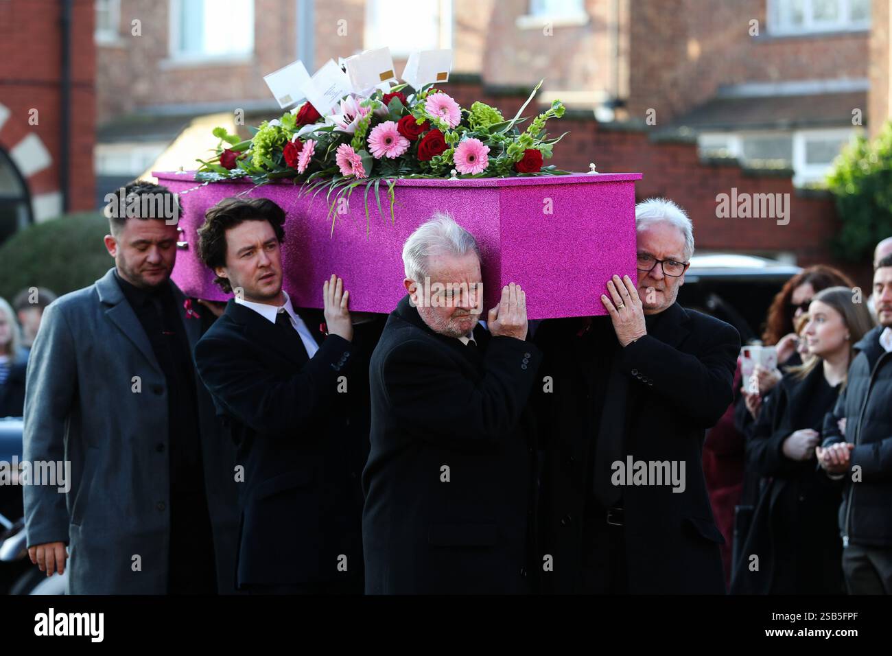 The coffin of Linda Nolan is carried into the funeral during the The ...