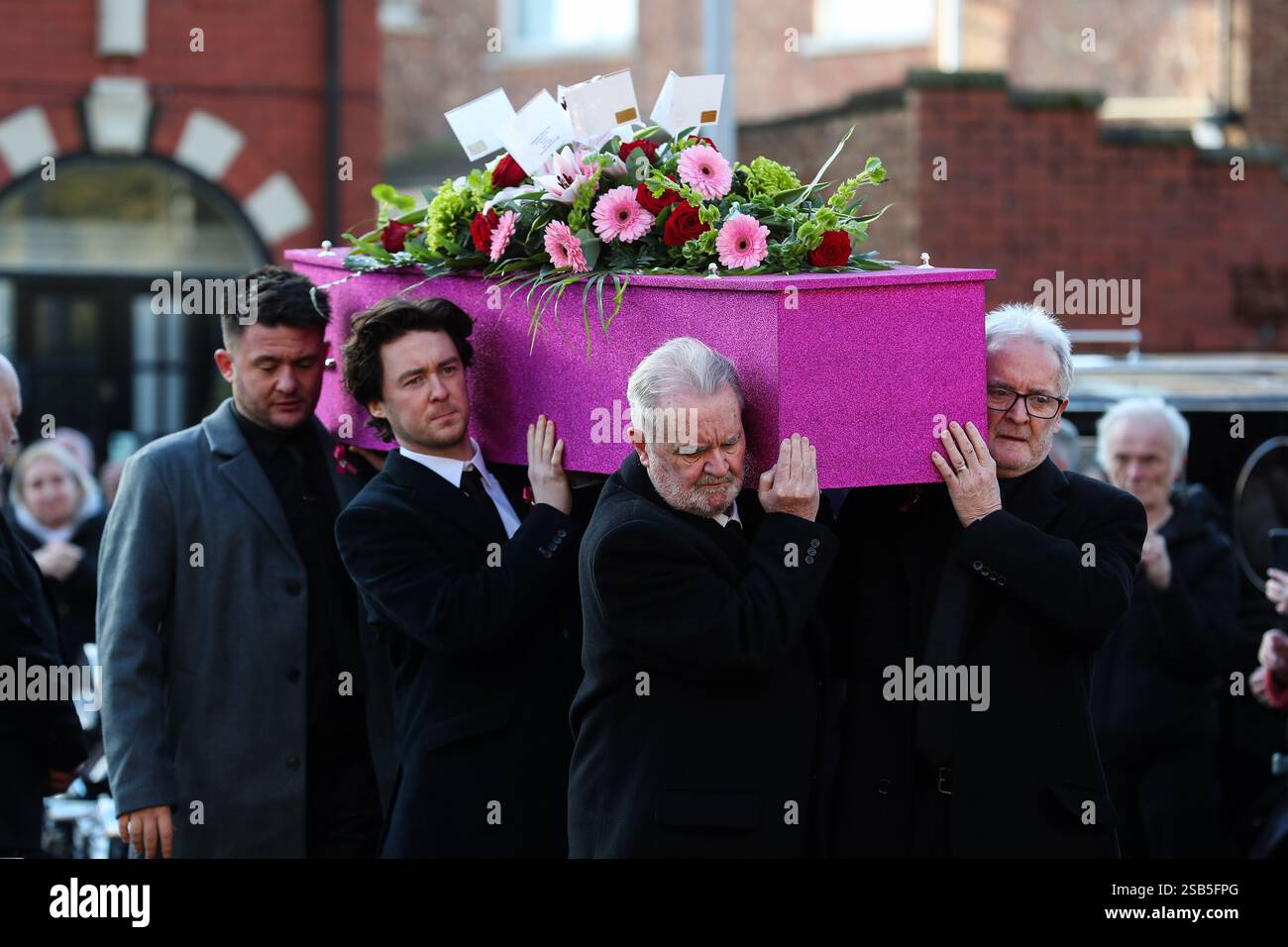 The coffin of Linda Nolan is carried into the funeral during the The ...