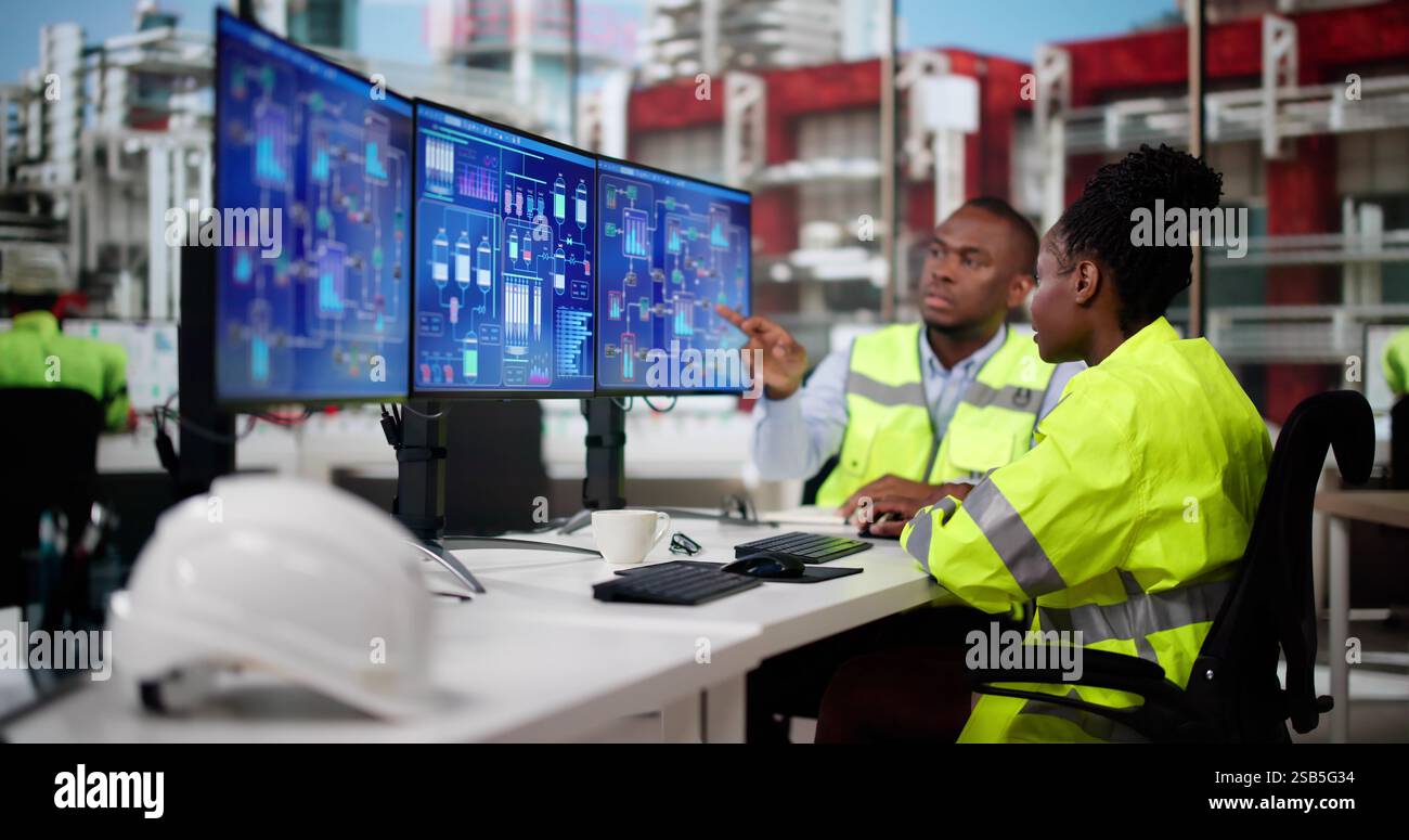 Automated Computer Technology At Industrial Plant. Checking Screens ...