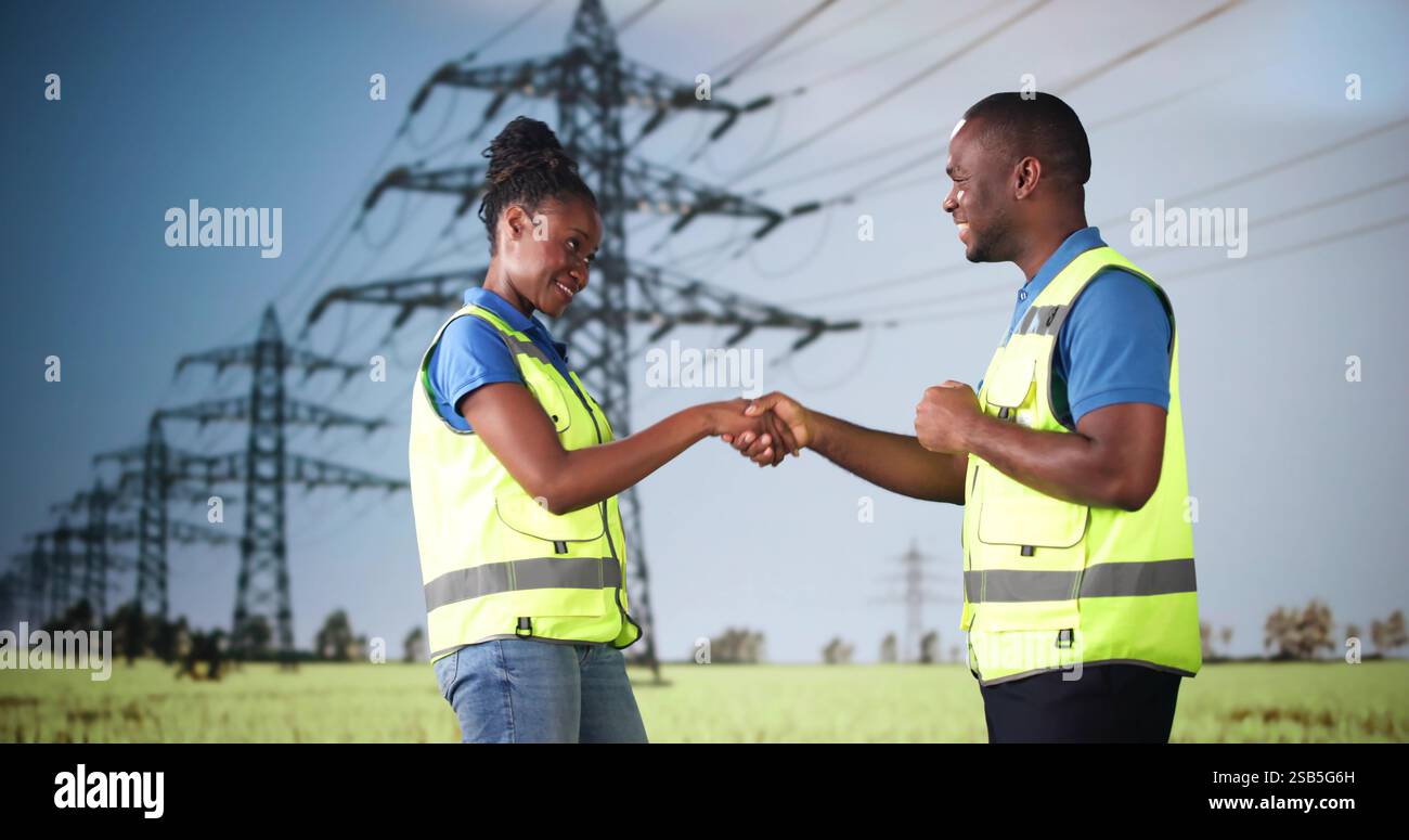 Electrician Workers Shaking Hands Near High Voltage Circuit Line Tower ...