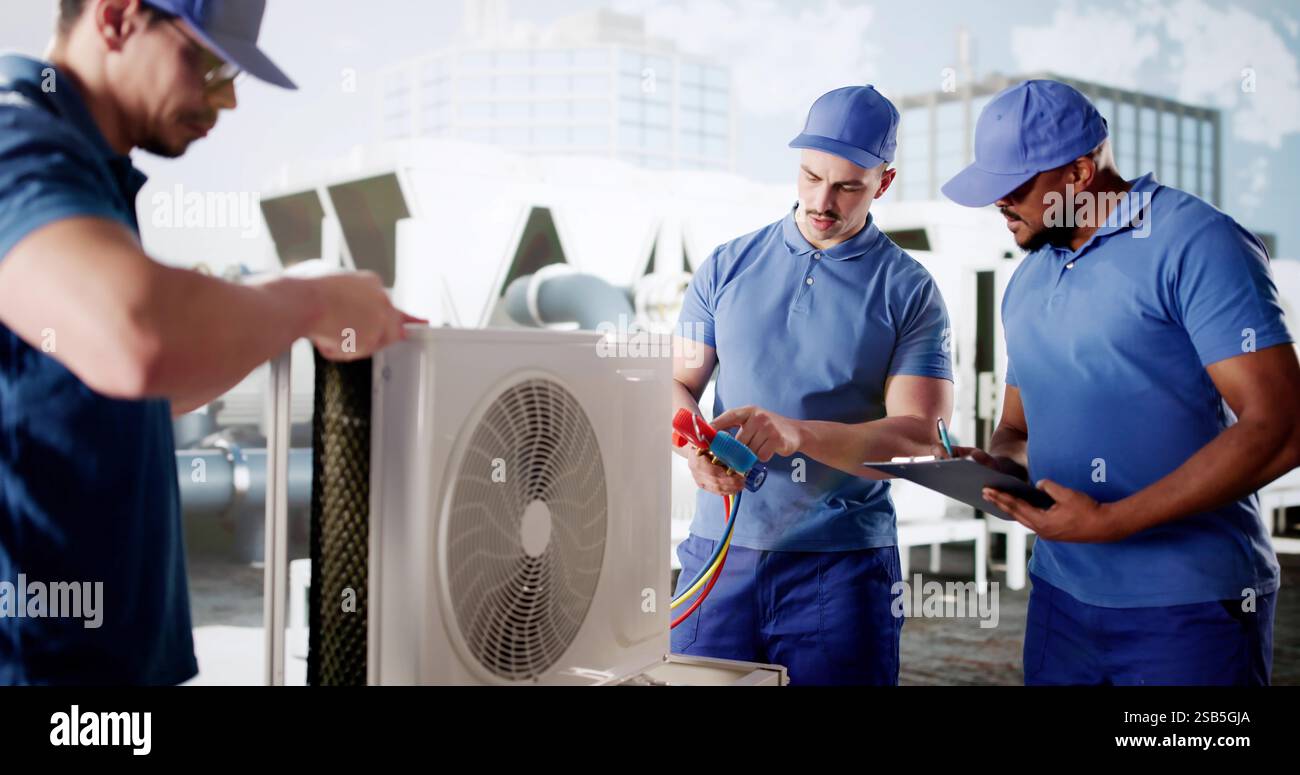 diverse group of workers inspecting and installing commercial HVAC ...