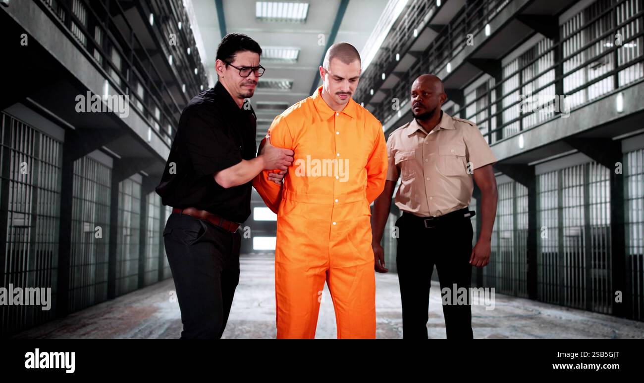 Guard Leading Diverse Group Of Inmates Back To Their Cells Stock Photo ...
