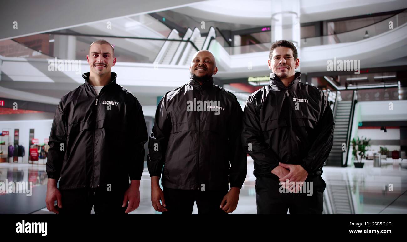Security Guard Officers Stand In Shopping Mall, Protecting Retail Shops ...