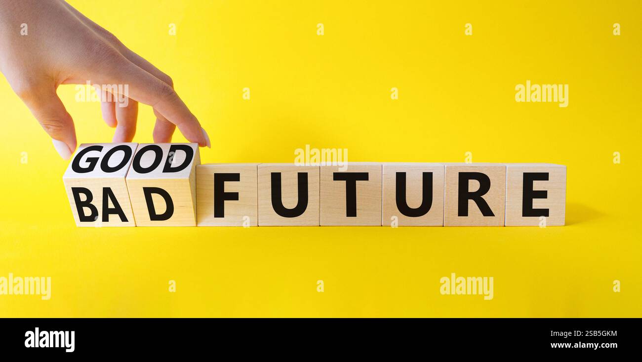Good and bad Future symbol. Businessman hand Turnes wooden cubes and ...
