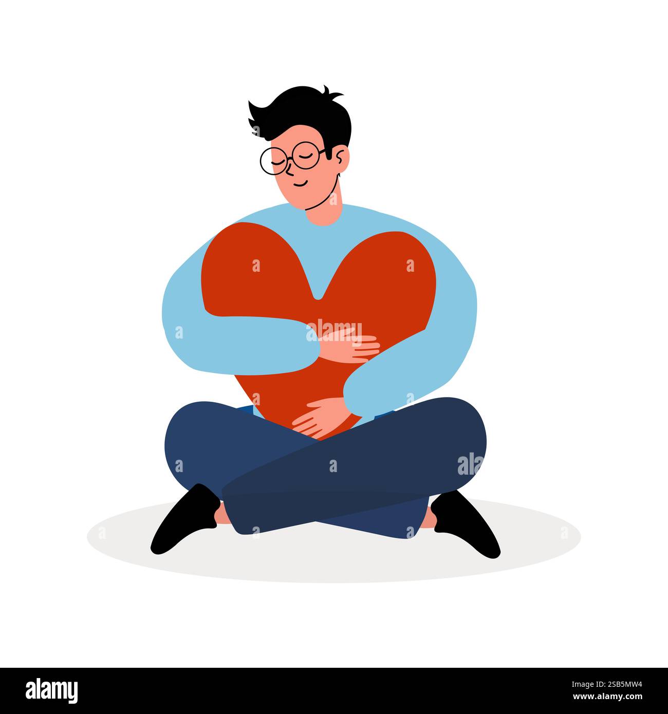 A man is seated on the ground, hugging a large red heart, symbolizing ...