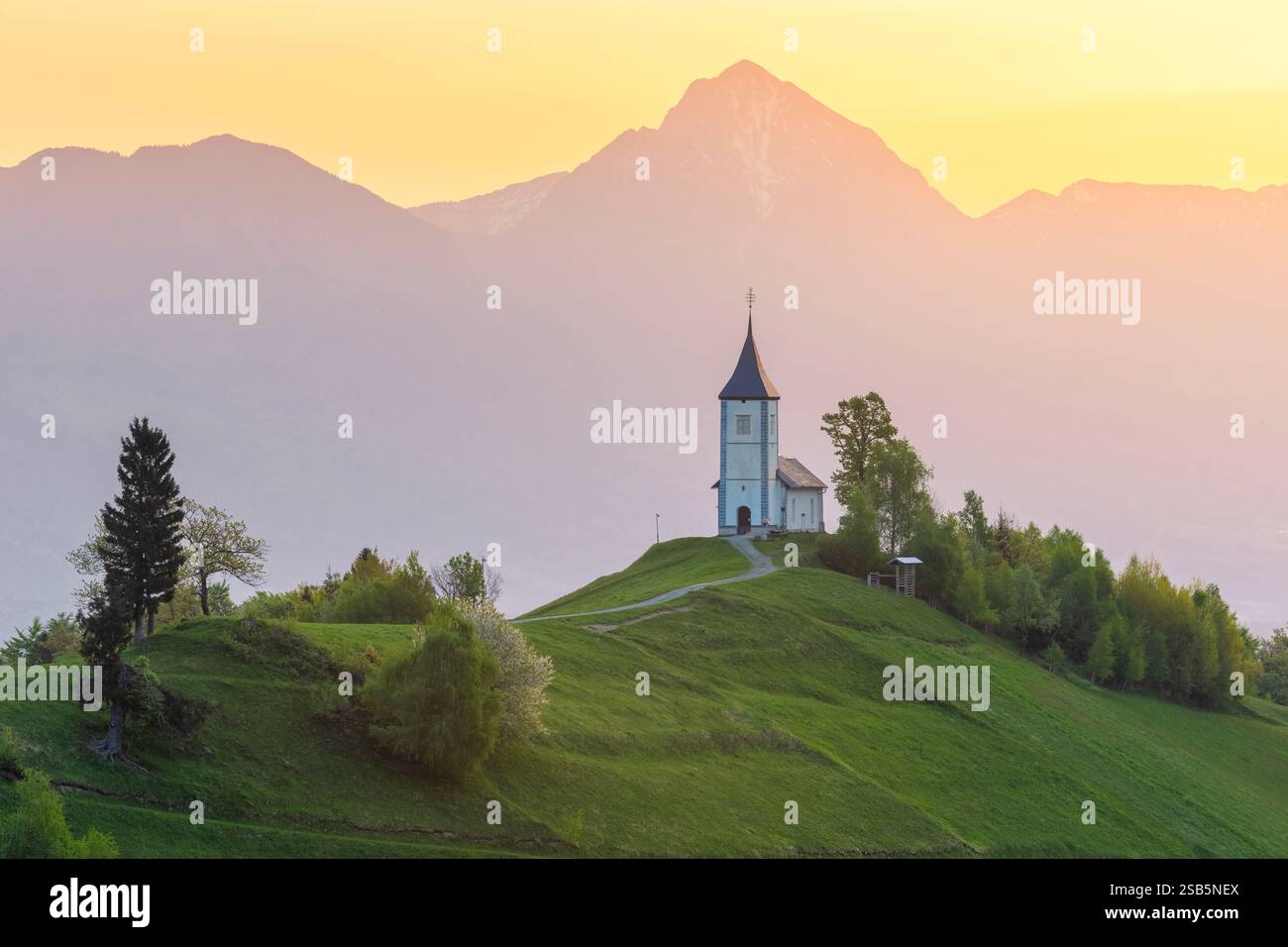 The iconic Jamik church, with Mount Triglav on the background at ...
