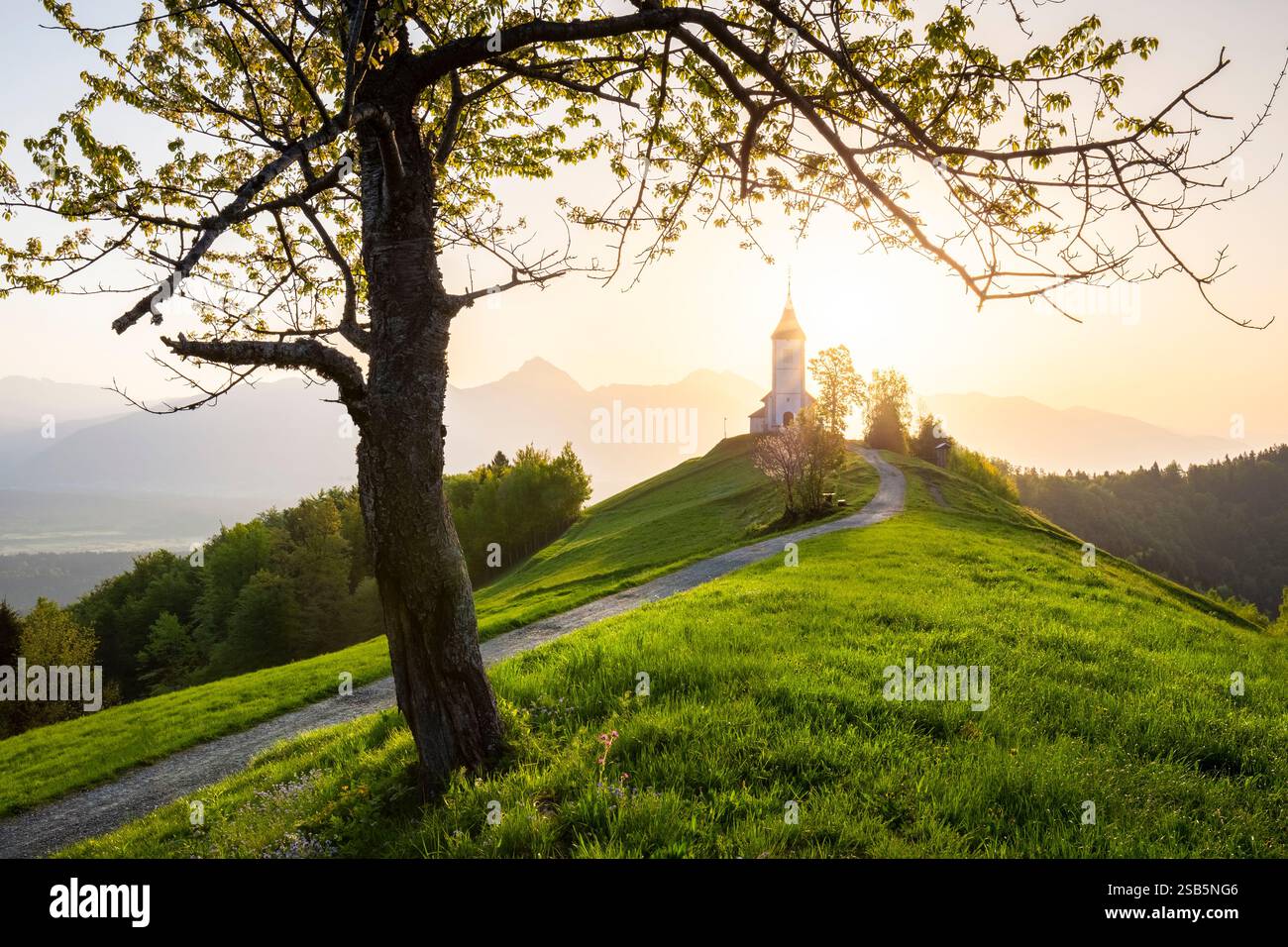 The iconic Jamik church, with Mount Triglav on the background at ...