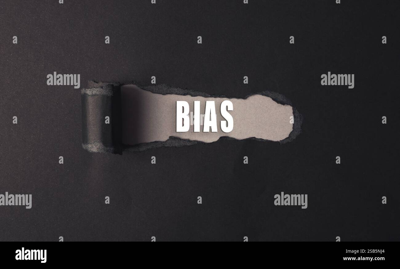 Black and white image of a hole in a piece of paper with the word bias ...