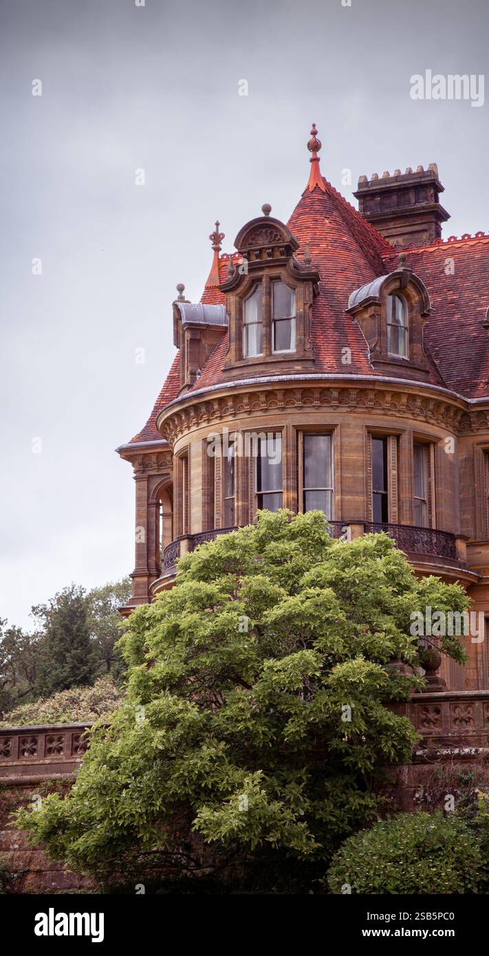 An imposing gothic style mansion situated in the countryside of England ...