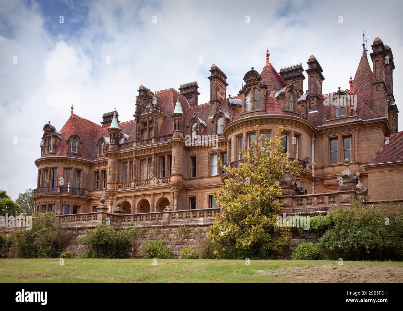 An imposing gothic style mansion situated in the countryside of England ...
