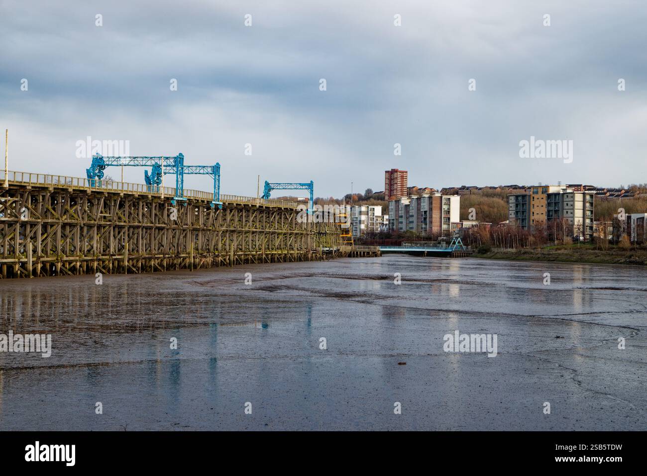 Exposed mud of the tidal lagoon at Dunston Staithes, Newcastle, England ...