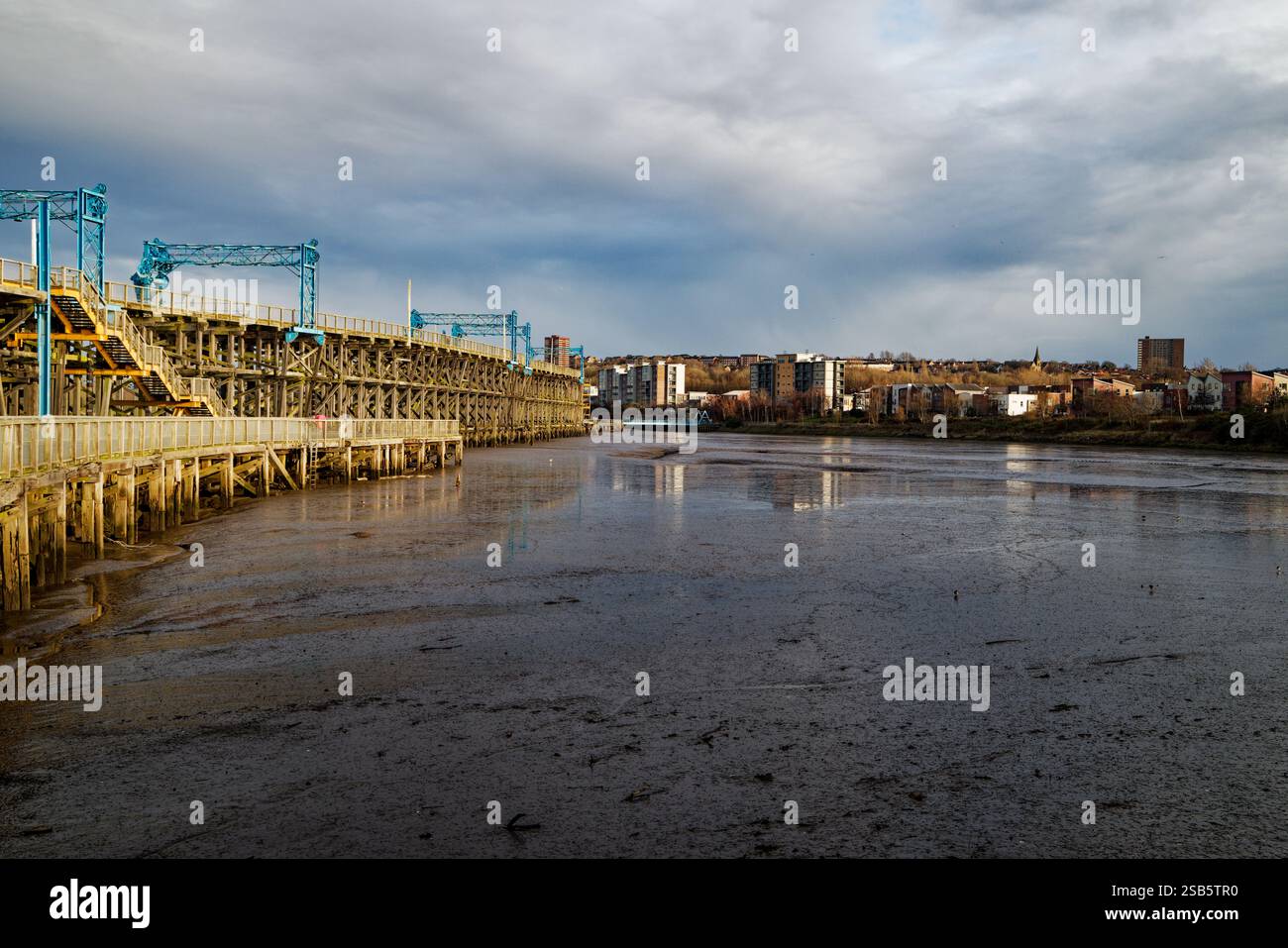 Exposed mud of the tidal lagoon at Dunston Staithes, Newcastle, England ...