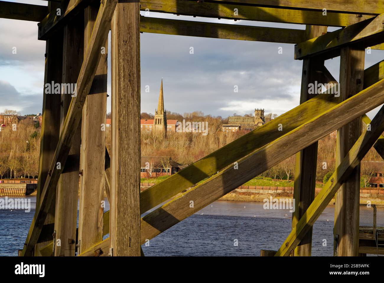 Elswick riverside viewed through the wooden trestle structure of the ...
