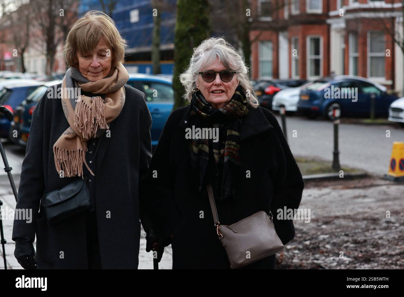 Marie Devlin (right) the widow Seamus Heaney of arrives for the funeral ...
