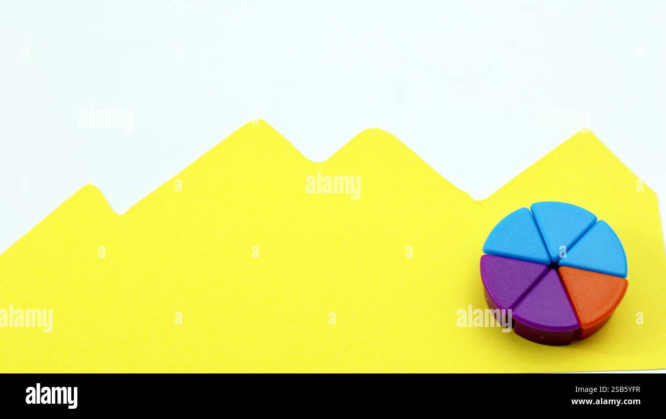 Pie chart made of colored wooden cubes with yellow background white ...