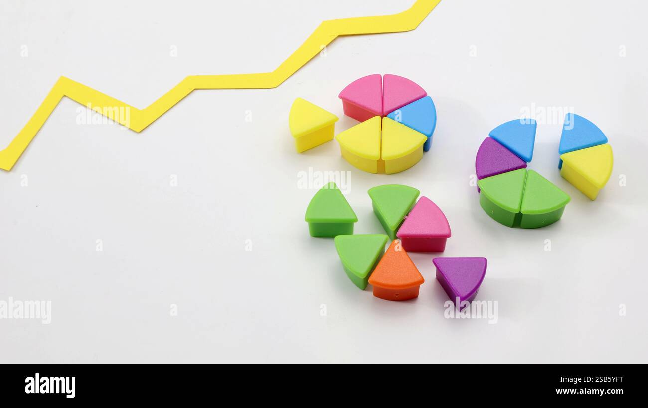 Three unit pie chart broken down, made of colored wooden cubes with ...
