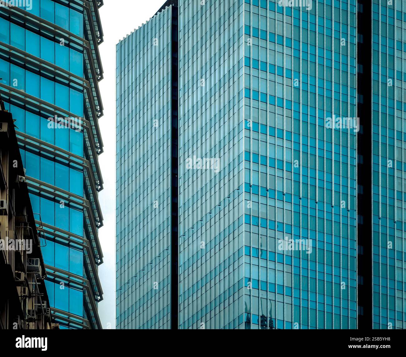 Close-up view of modern glass buildings in Hong Kong. Sleek ...