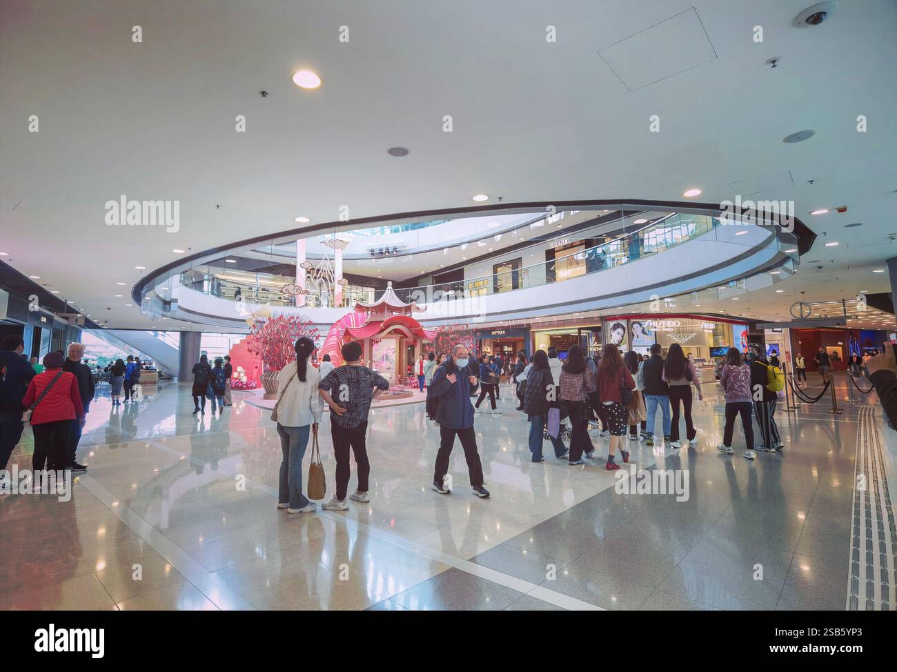 Hong Kong, China - February 01, 2025 : A bustling shopping mall atrium ...