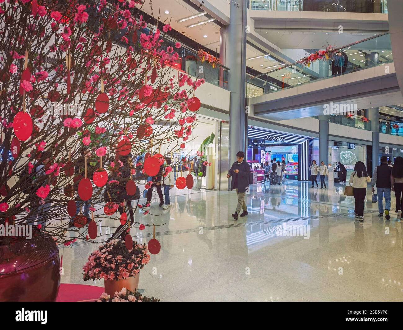 Hong Kong, China - February 01, 2025 : A vibrant shopping mall adorned ...