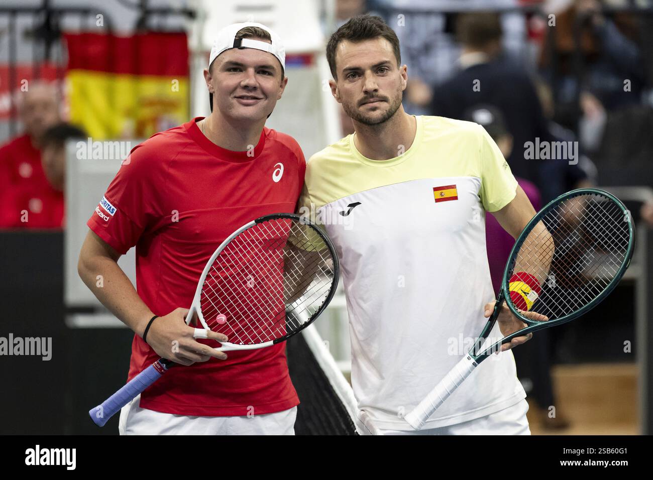 Switzerland's Dominic Stricker, left, and Spain's Pedro Martinez, right ...