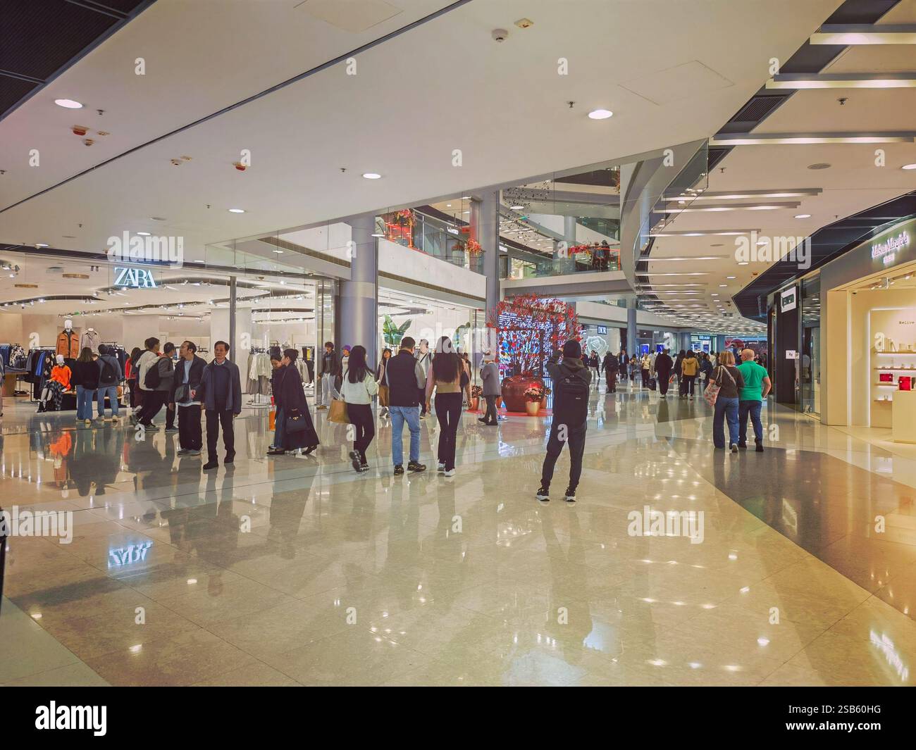 Hong Kong, China - February 01, 2025 : A bustling shopping mall scene ...