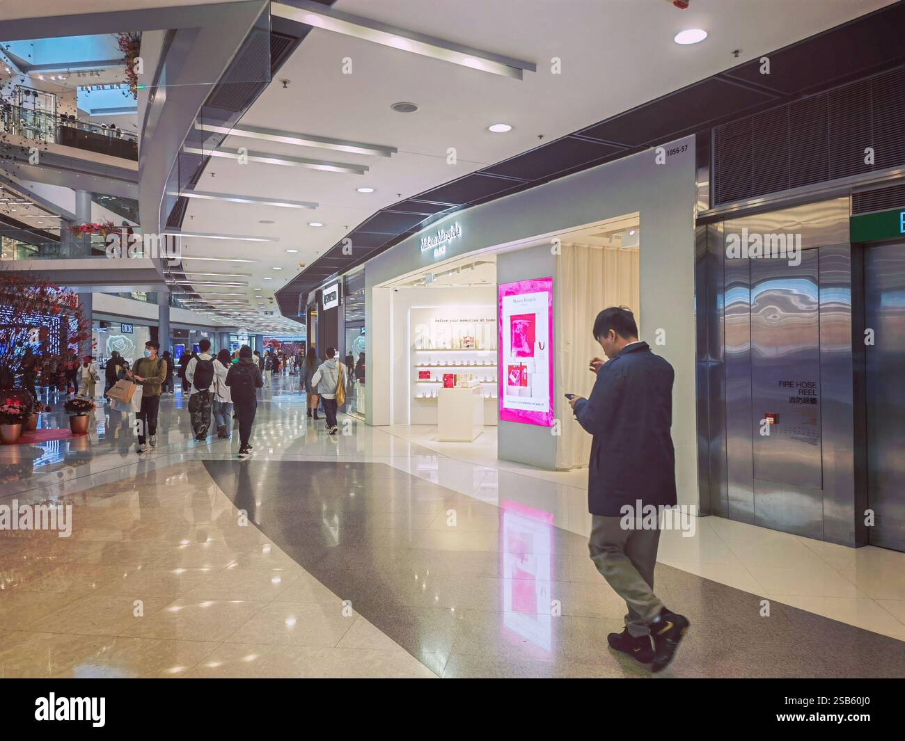Hong Kong, China - February 01, 2025 : A bustling shopping mall scene ...