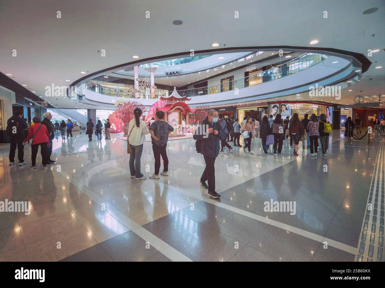 Hong Kong, China - February 01, 2025 : A bustling shopping mall atrium ...