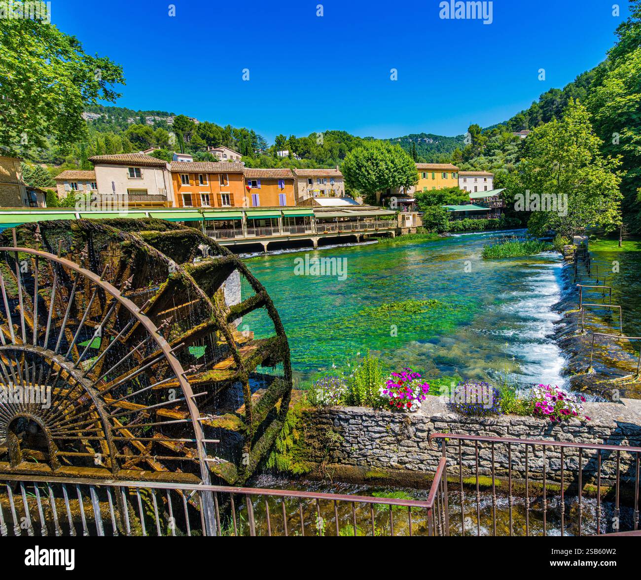 Water wheels on the River Sorgue in Fontaine de Vaucluse. Vaucluse, Provence, France, Europe ...