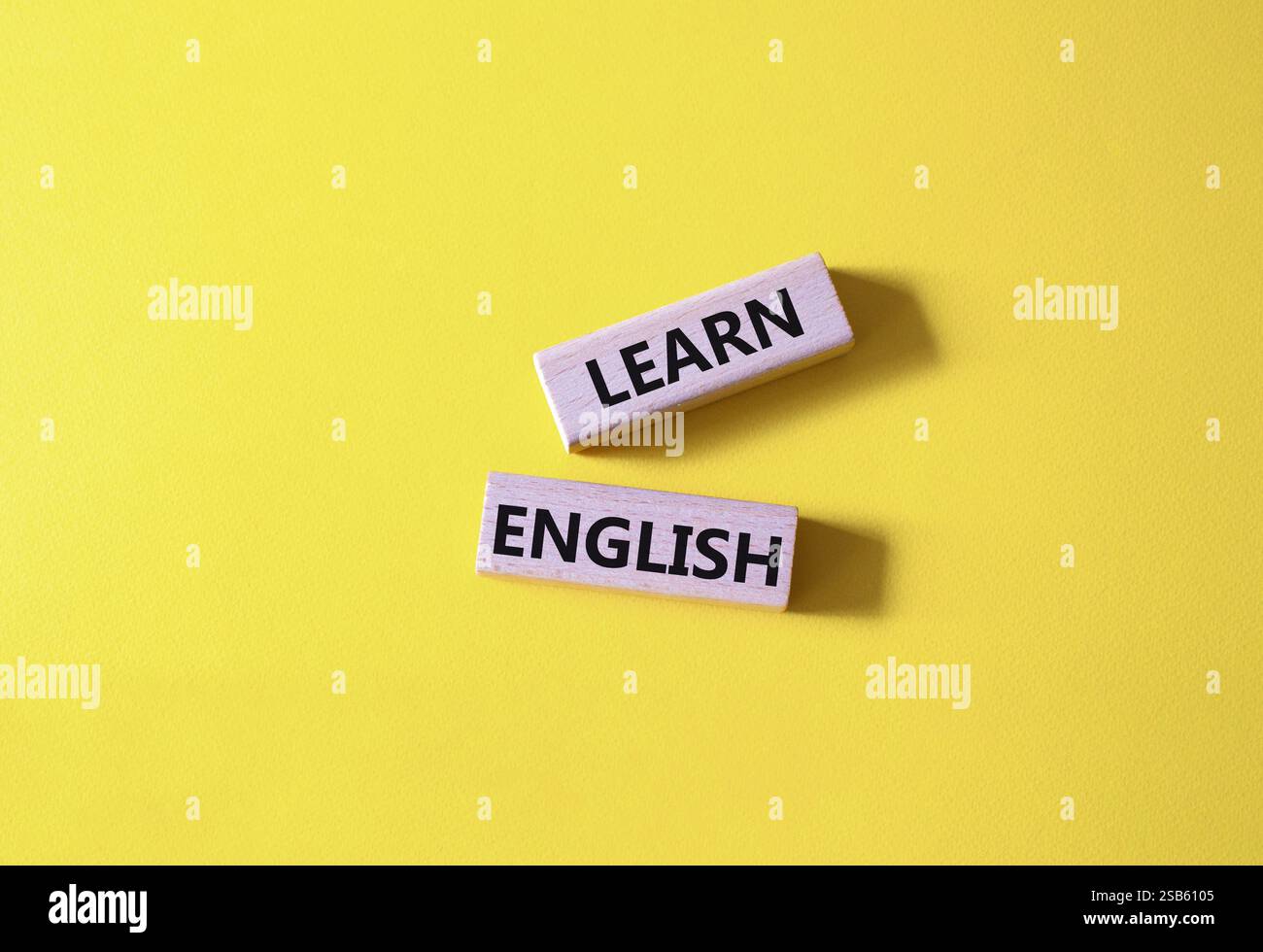 Learn English symbol. Wooden blocks with words Learn English. Beautiful ...