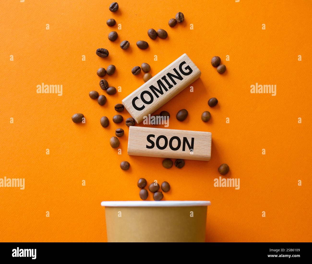 Coming Soon symbol. Concept word Coming Soon on wooden blocks ...