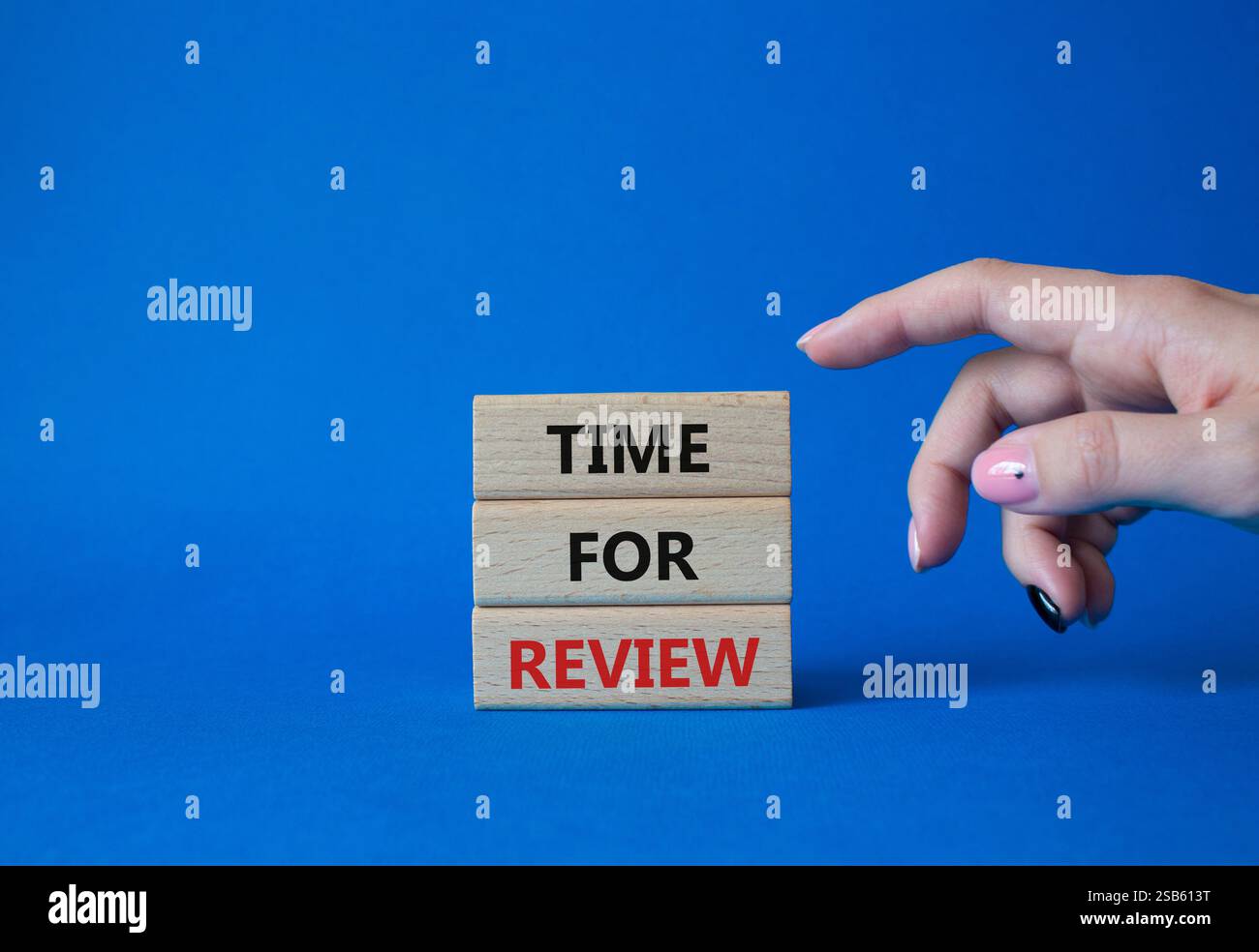 Time for Review symbol. Wooden blocks with words Time for Review ...