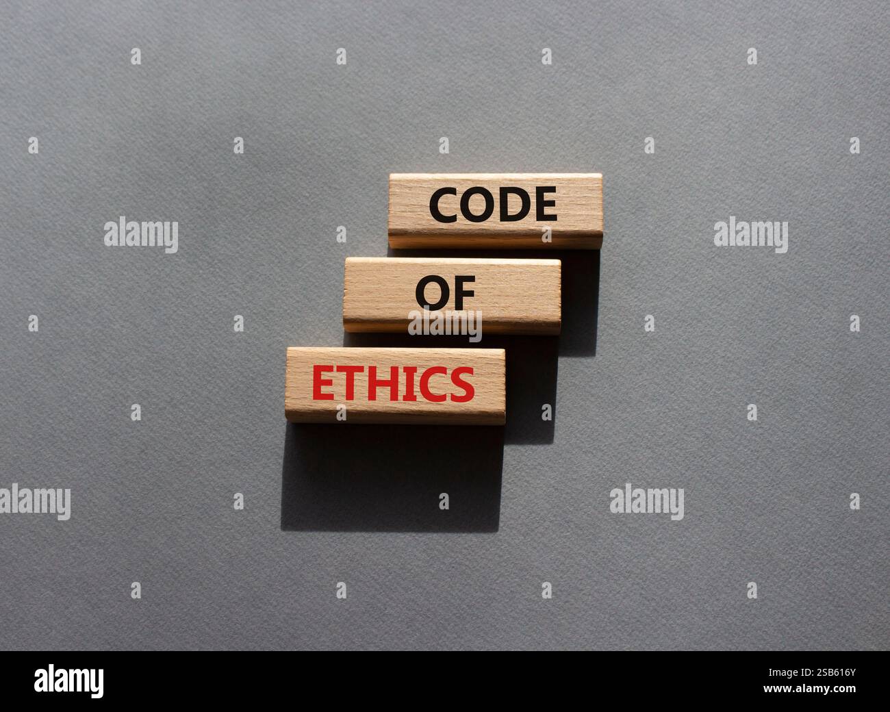 Code of ethics symbol. Concept words Code of ethics on wooden blocks ...