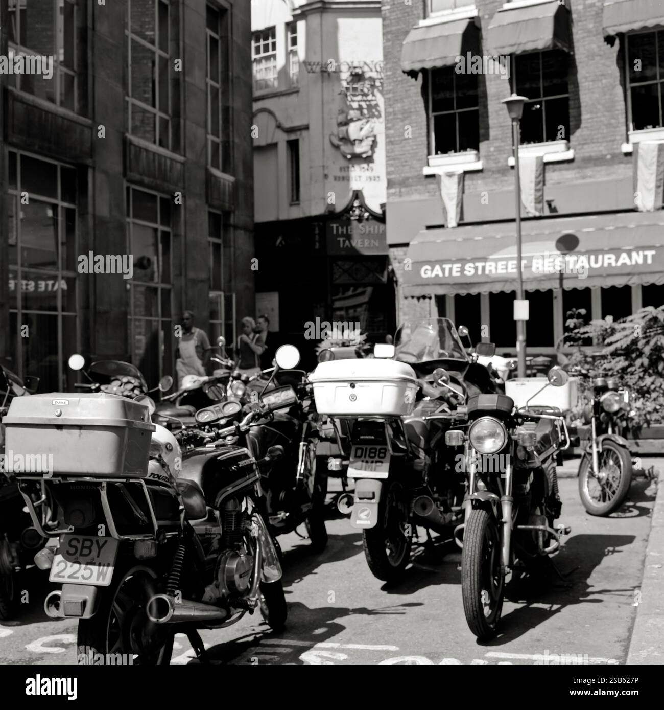 Motor bikes parked outside The Ship Tavern and the Gate Street ...