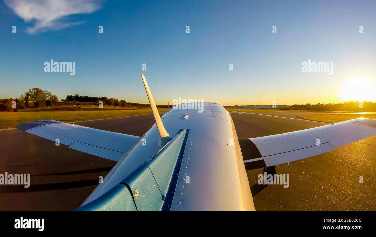 A small general aviation aircraft, its pre-takeoff checklist complete ...