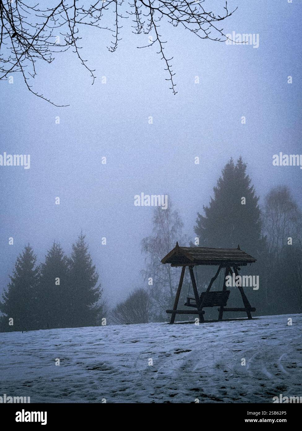 winter mountain cabin in romania, foggy weather, snow on the mountain ...