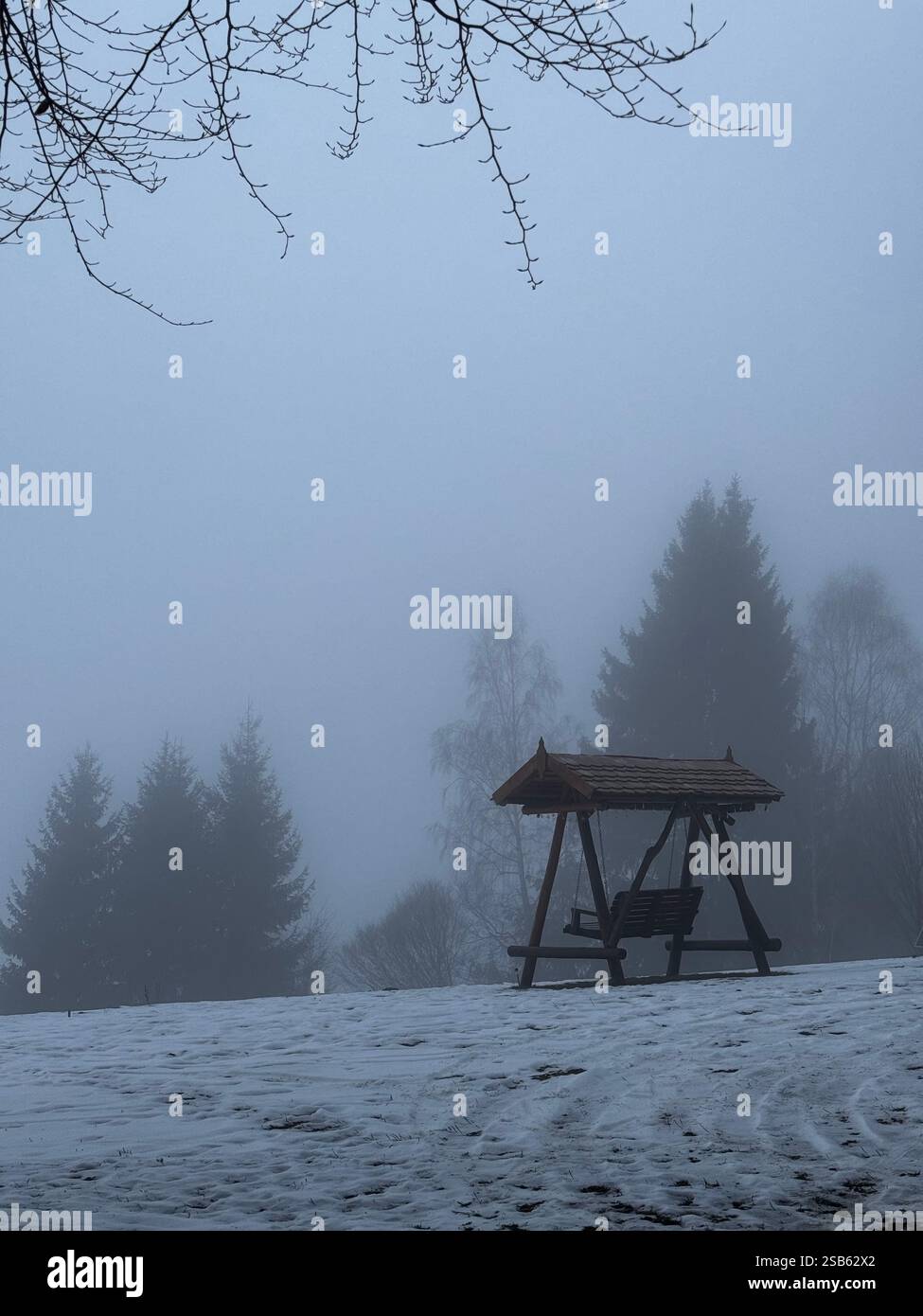 winter mountain cabin in romania, foggy weather, snow on the mountain ...