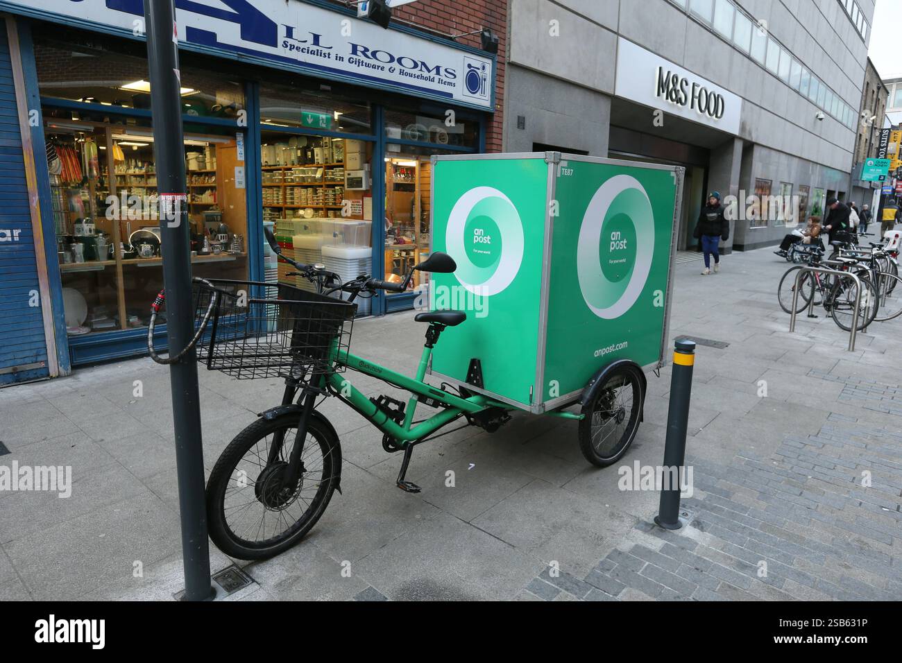 Dublin, Ireland - 21st January 2025 - a green An Post postal cargo bike ...