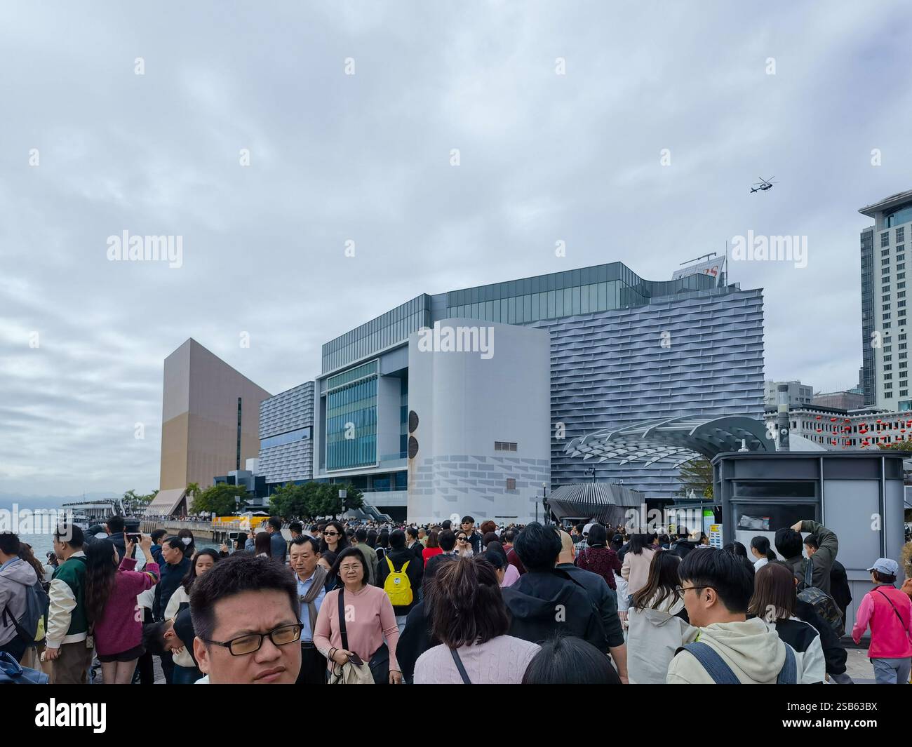 Hong Kong, China - February 01, 2025 : A bustling crowd enjoys the Tsim ...