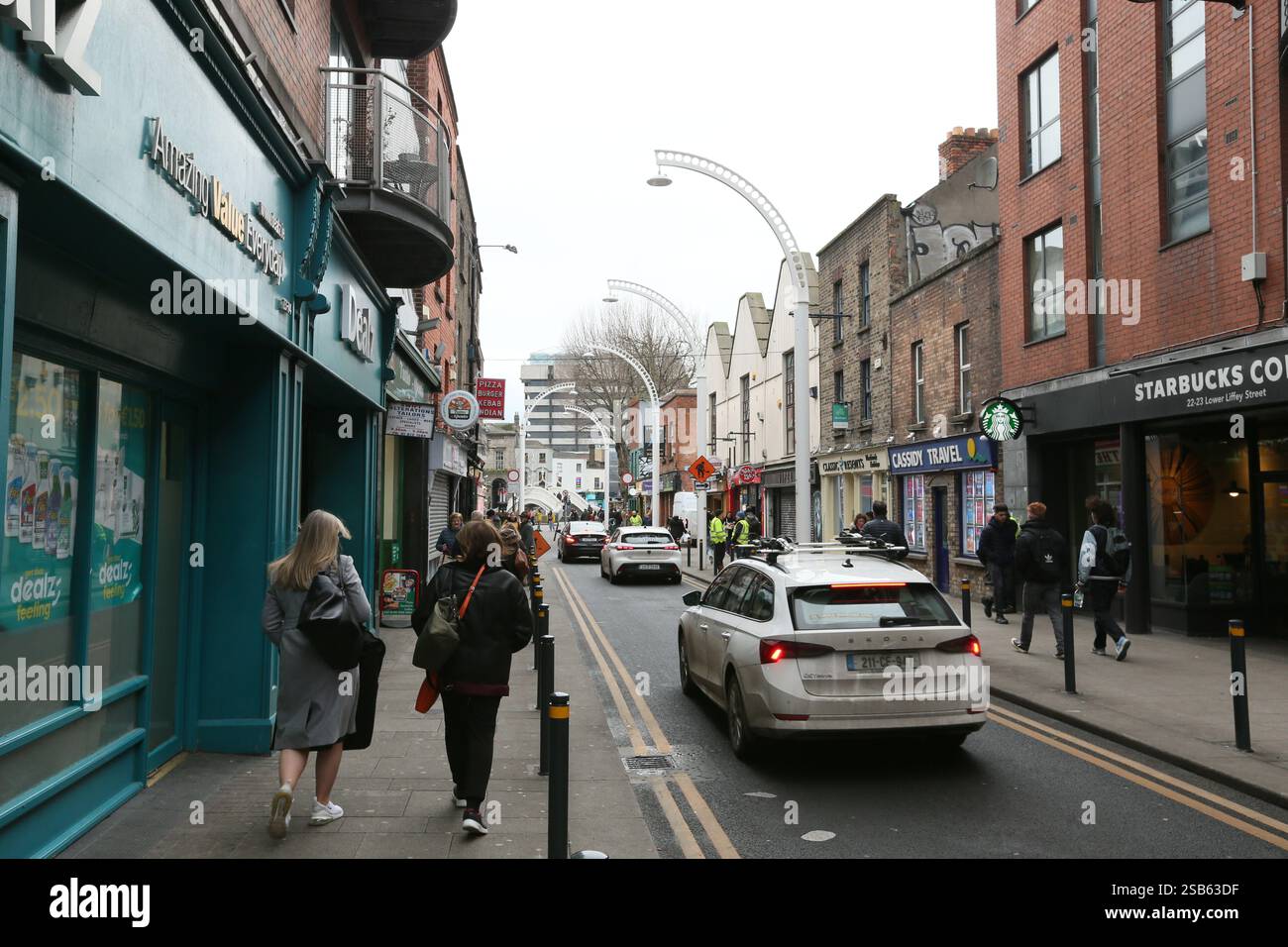 Dublin, Ireland - 21st January 2025 - A scene of pedestrians and cars ...