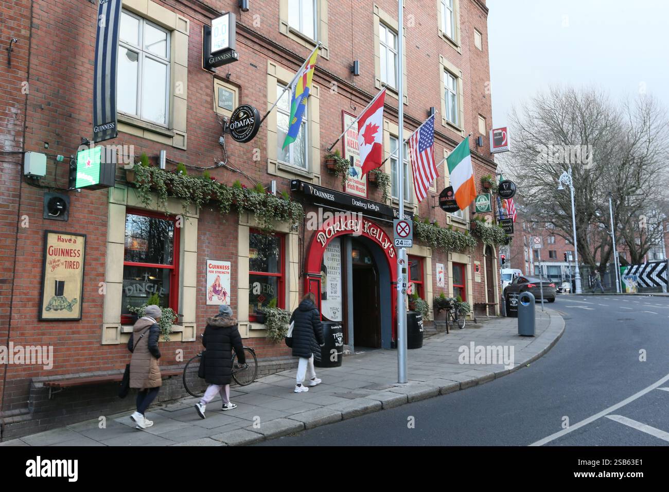 Dublin, Ireland - 21st January 2025 - 3 women walking on the footpath ...