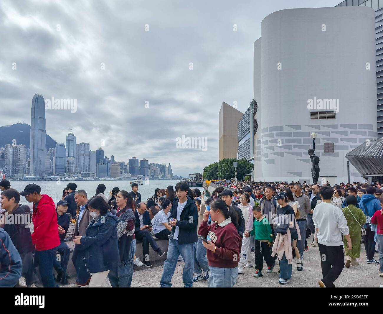 Hong Kong, China - February 01, 2025 : A bustling crowd enjoys the Tsim ...