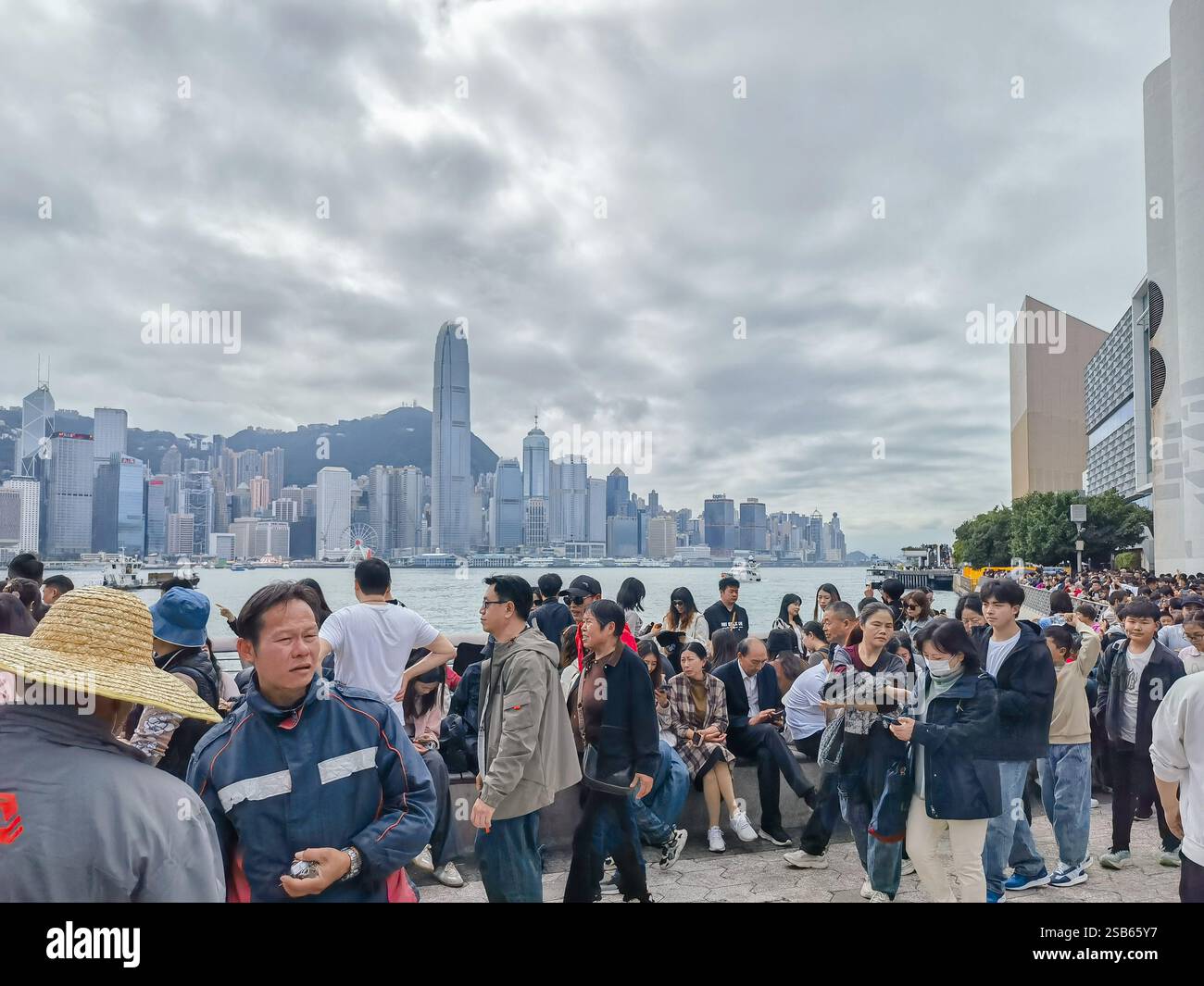Hong Kong, China - February 01, 2025 : A large crowd of tourists enjoys ...