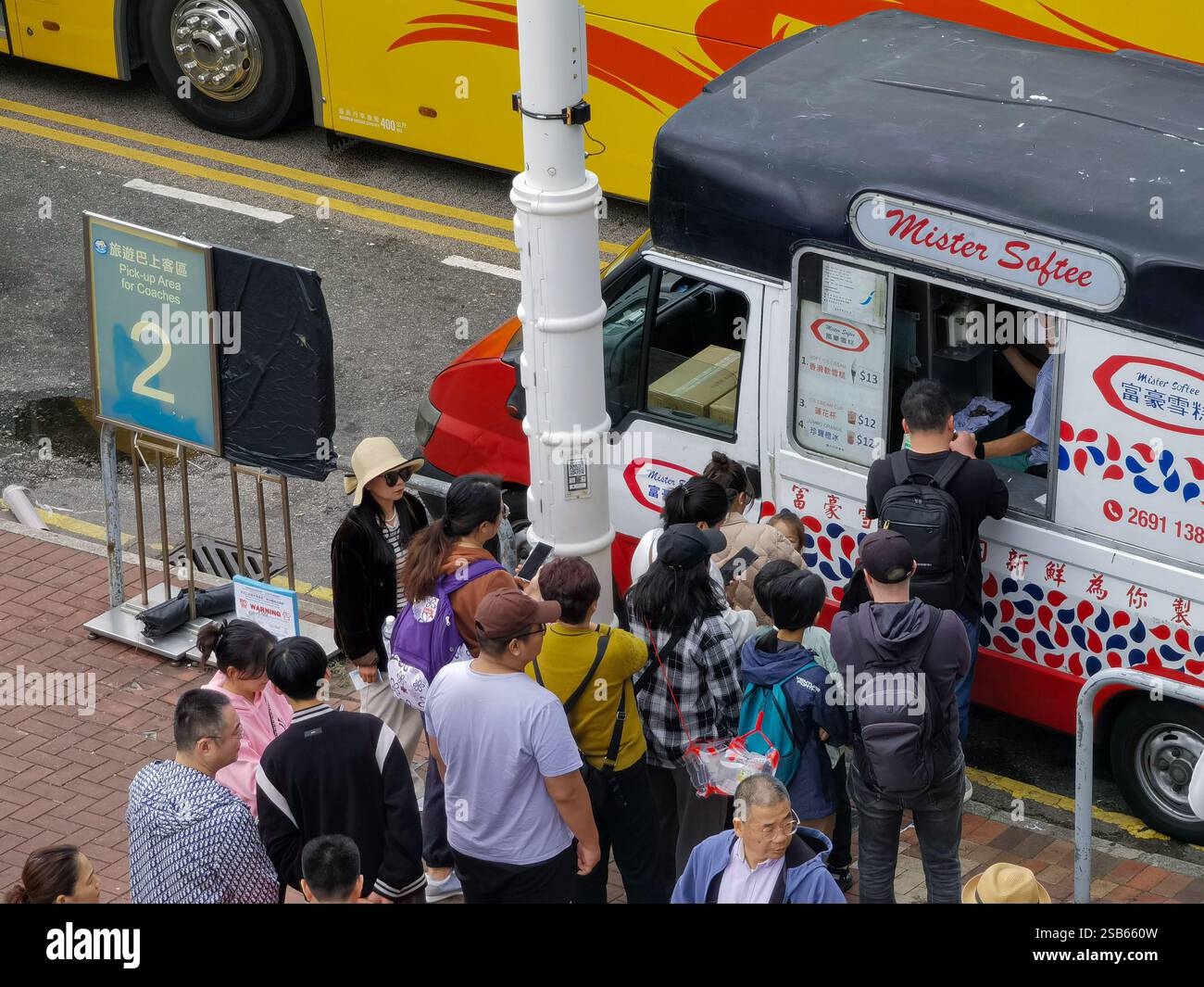 Hong Kong, China - February 01, 2025 : A long queue of tourists waits ...